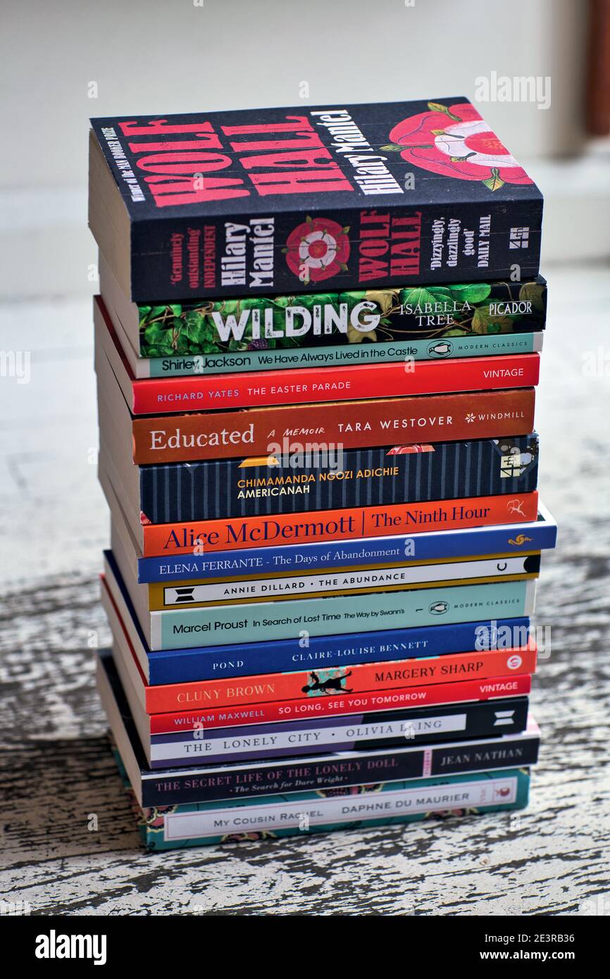 Books inside white paper hi-res stock photography and images - Alamy