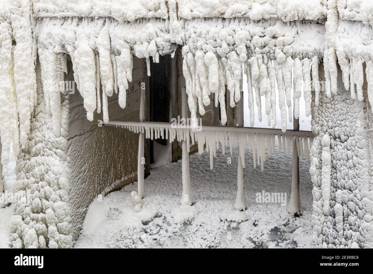 Frozen floodgate of small dam on the river.Extremely Cold Weather Stock ...