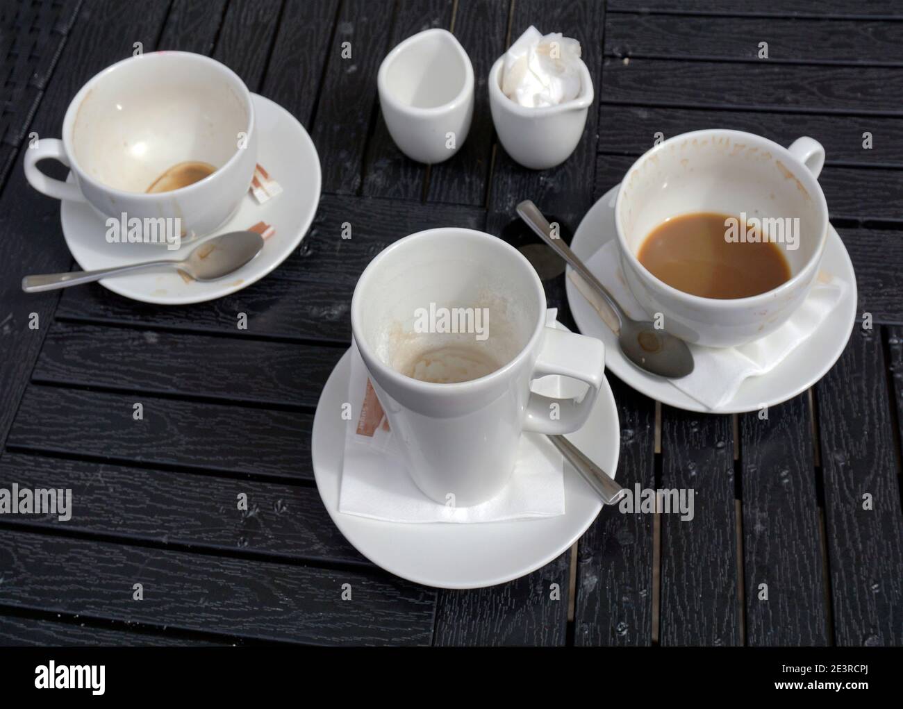 dirty coffee cups and mug on table at cafe Stock Photo - Alamy