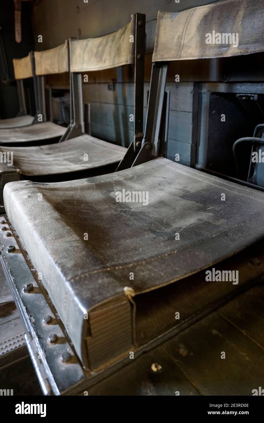 hard seating inside vintage military transport vehicle from world war ...