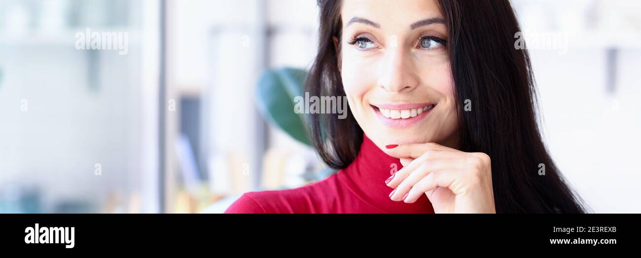 Woman model posing in front of the window Stock Photo - Alamy