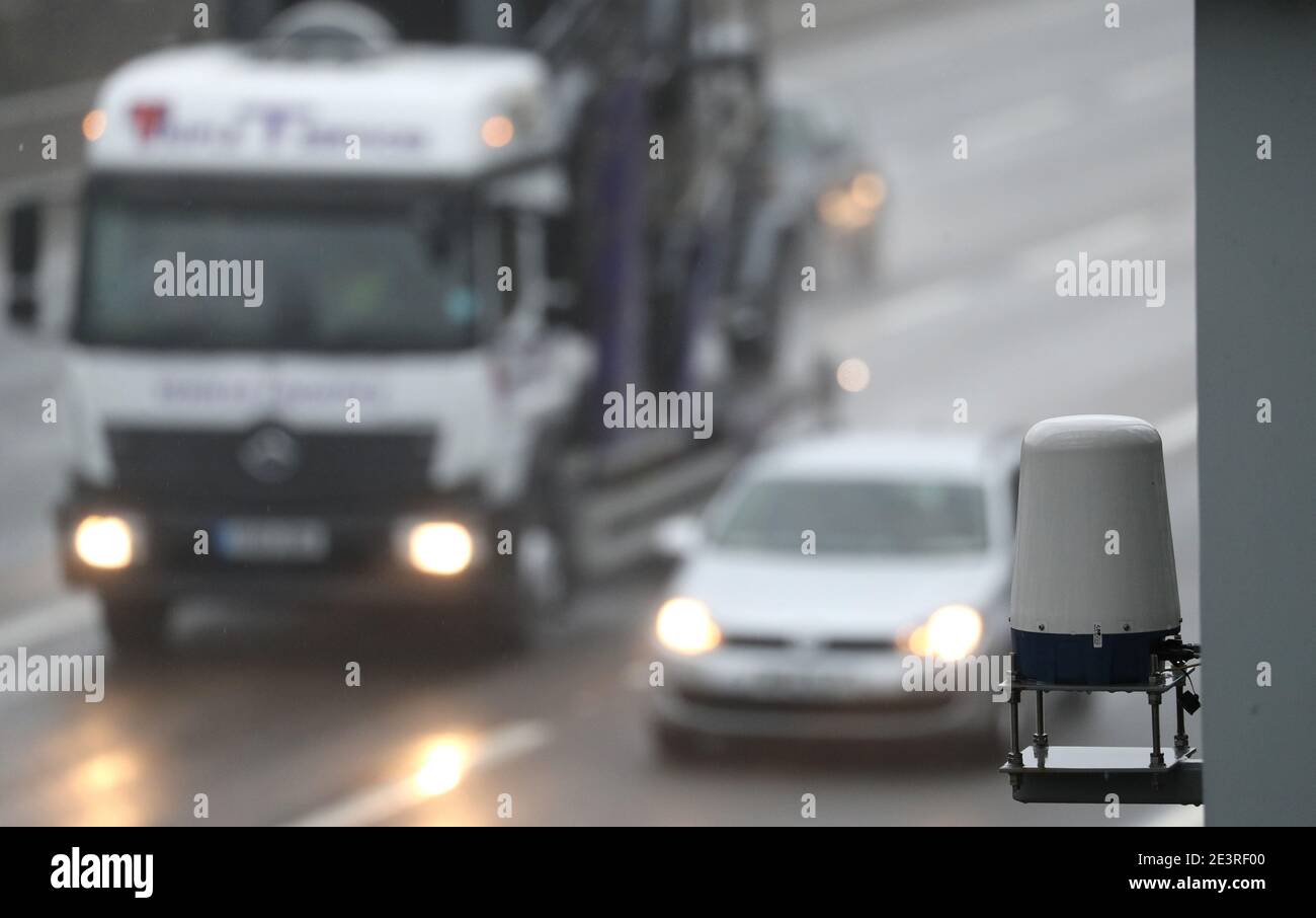 Vehicles pass a Stopped Vehicle Detection radar sensor mounted adjacent ...