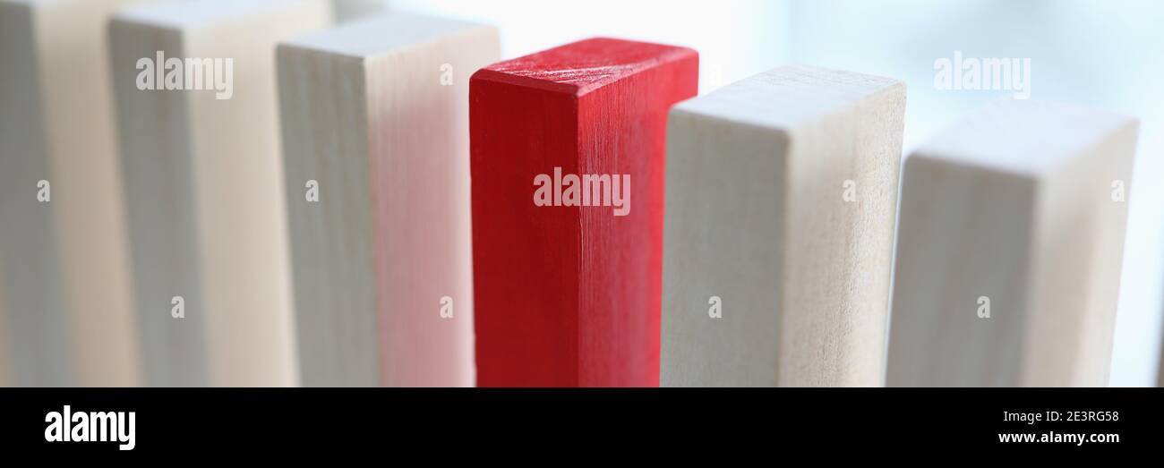White and red wooden blocks stands on a table Stock Photo - Alamy