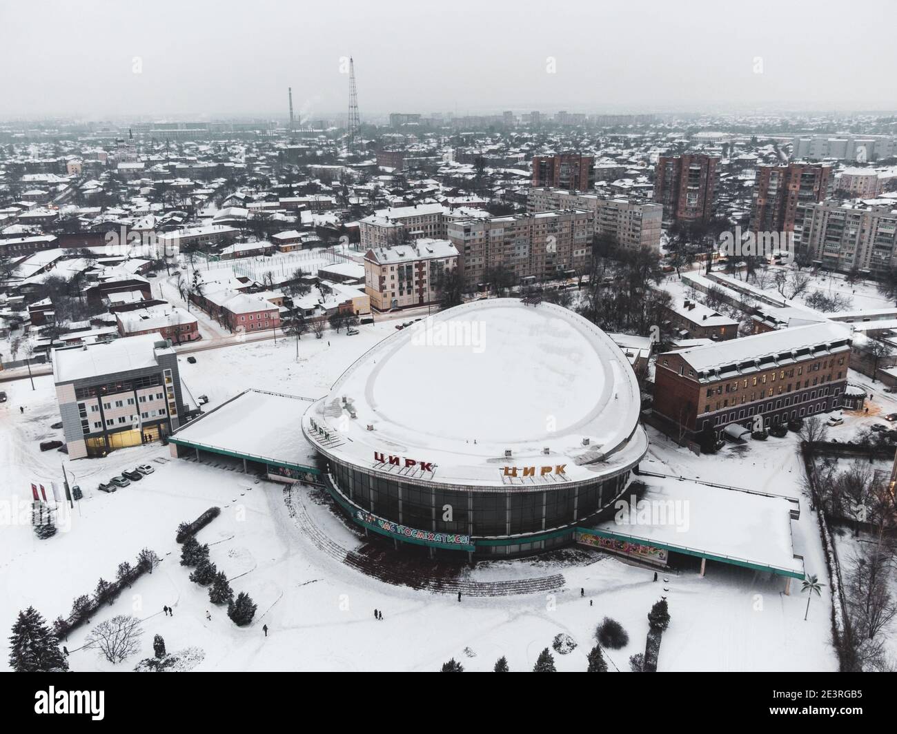 Round circus building dome roof covered in white snow. Kharkiv city ...