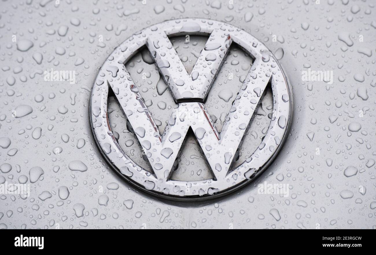 Hanover, Germany. 12th Jan, 2021. Raindrops bead on a Volkswagen logo ...