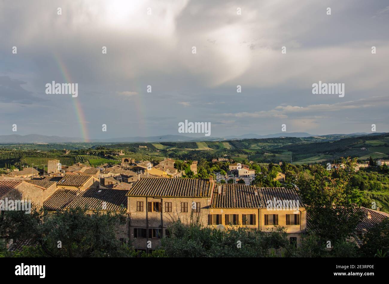 Italian rainy day with rainbow, big clouds. High quality photo Stock ...