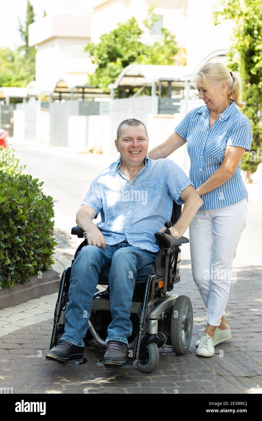 Lifestile of real disabled man on the wheelchair Stock Photo - Alamy