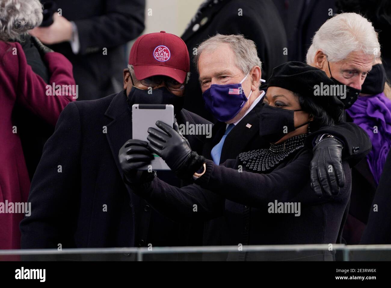 House Majority Whip James Clyburn of South Carolina, and former President George Bush, take a ...