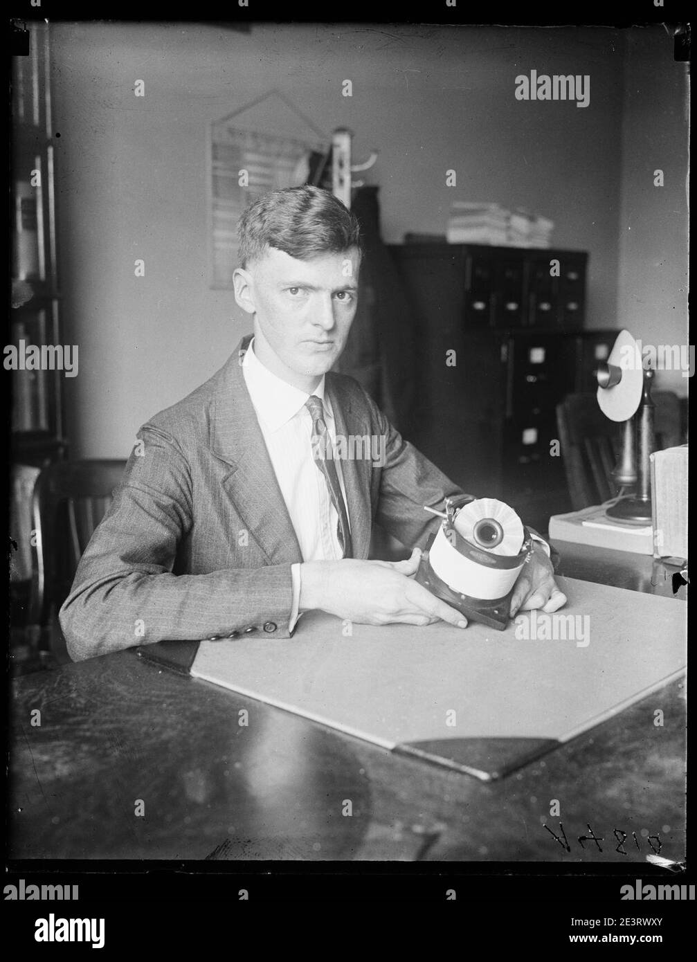 Man with machine part Stock Photo - Alamy