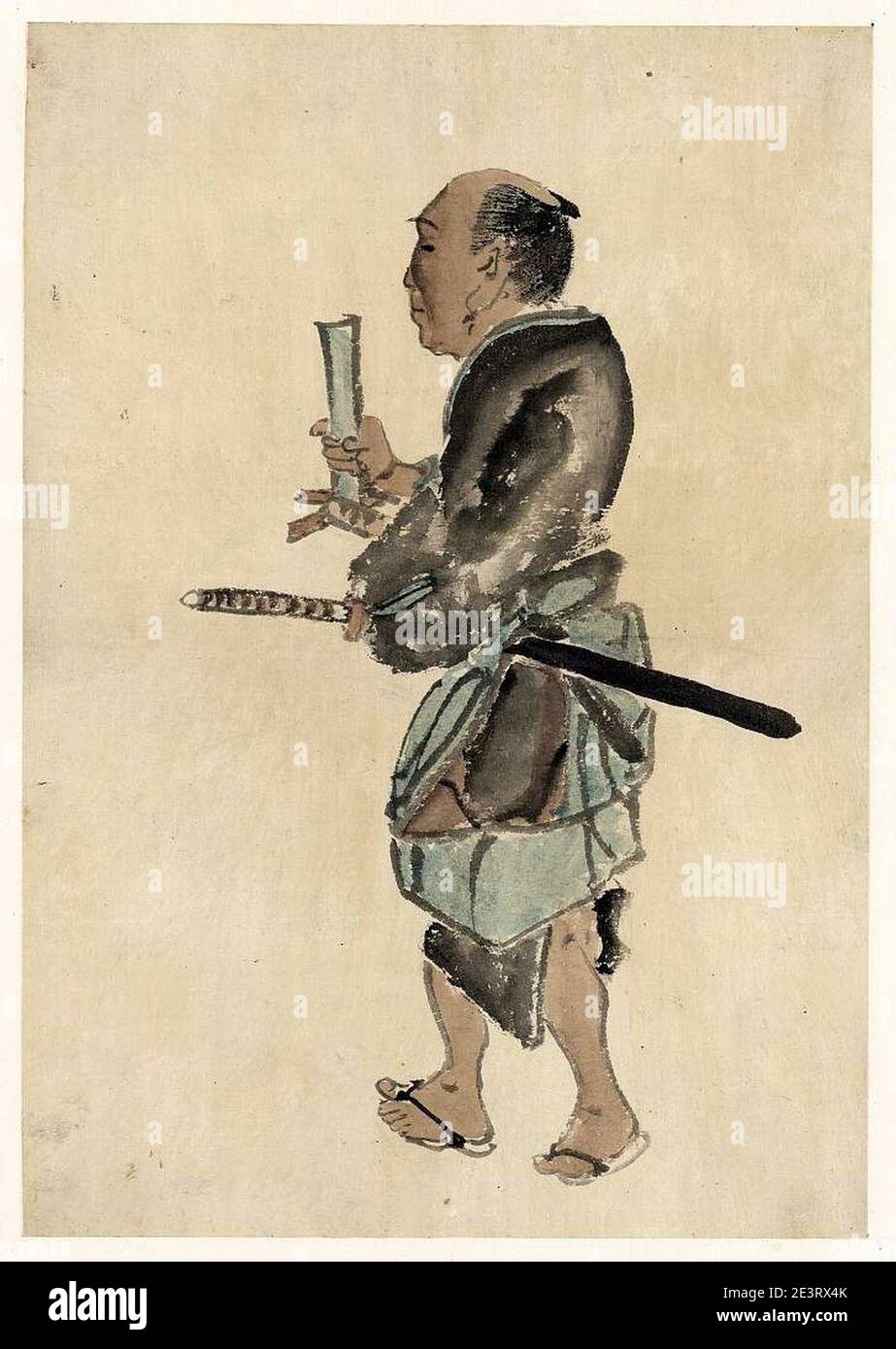 Man with a sword walking toward the left Stock Photo - Alamy