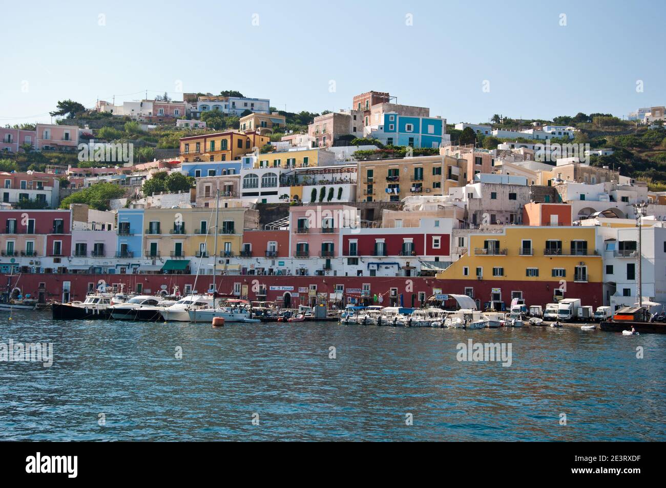 Port of the island of Ponza in the summer. The typical colored houses ...