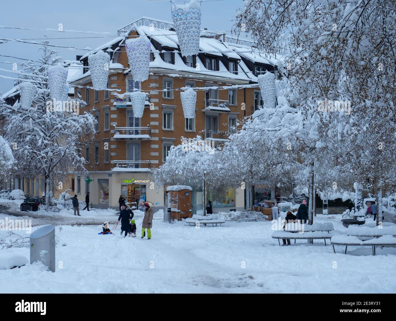Zurich, Switzerland - January 15th 2021: An urban square after heavy ...