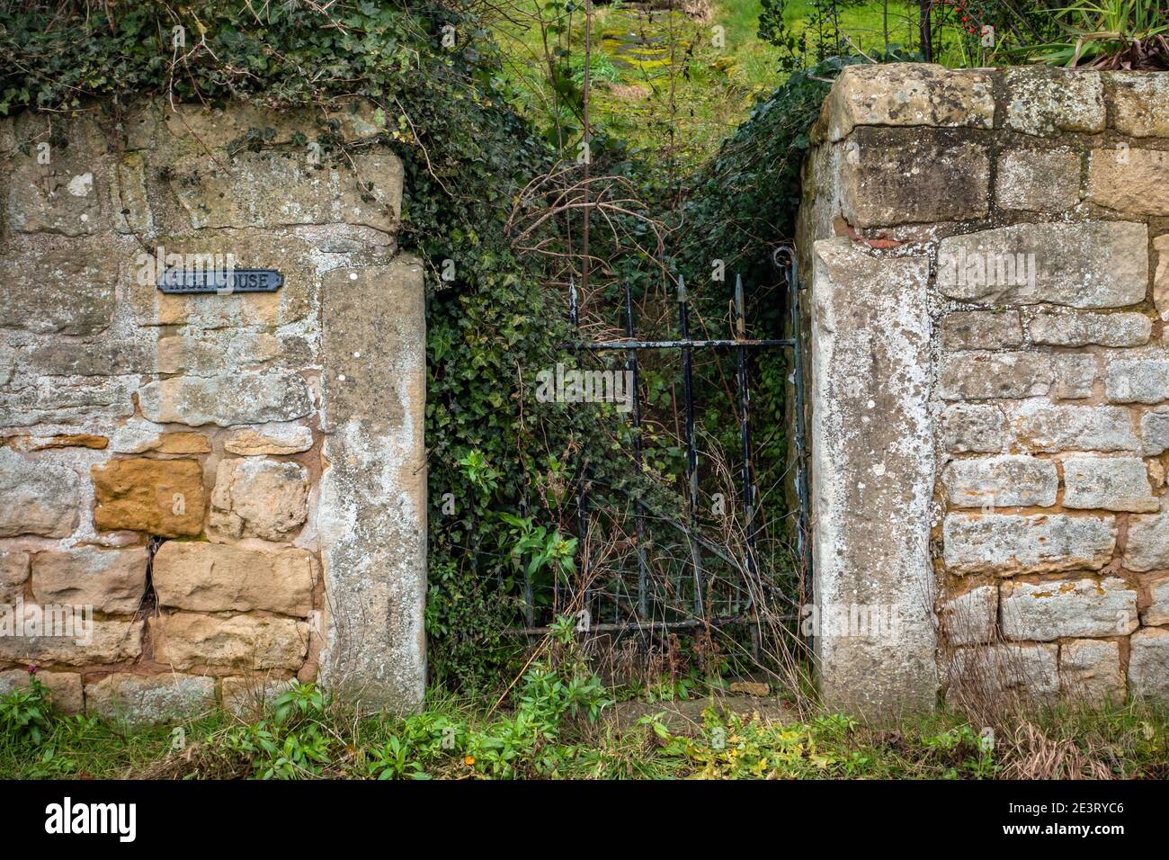 Old metal small gate of a village house Stock Photo - Alamy