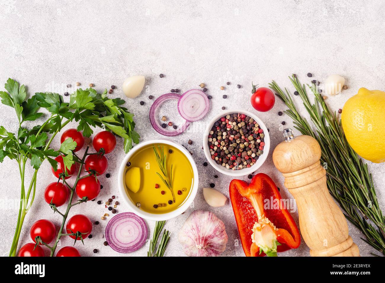 Herbs and condiments on light stone background. Top view with copy ...