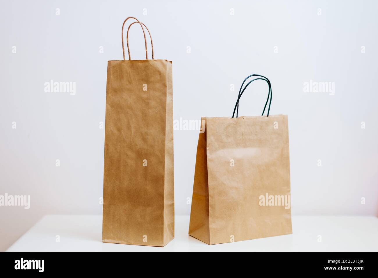 Kraft paper bag handles hi-res stock photography and images - Alamy