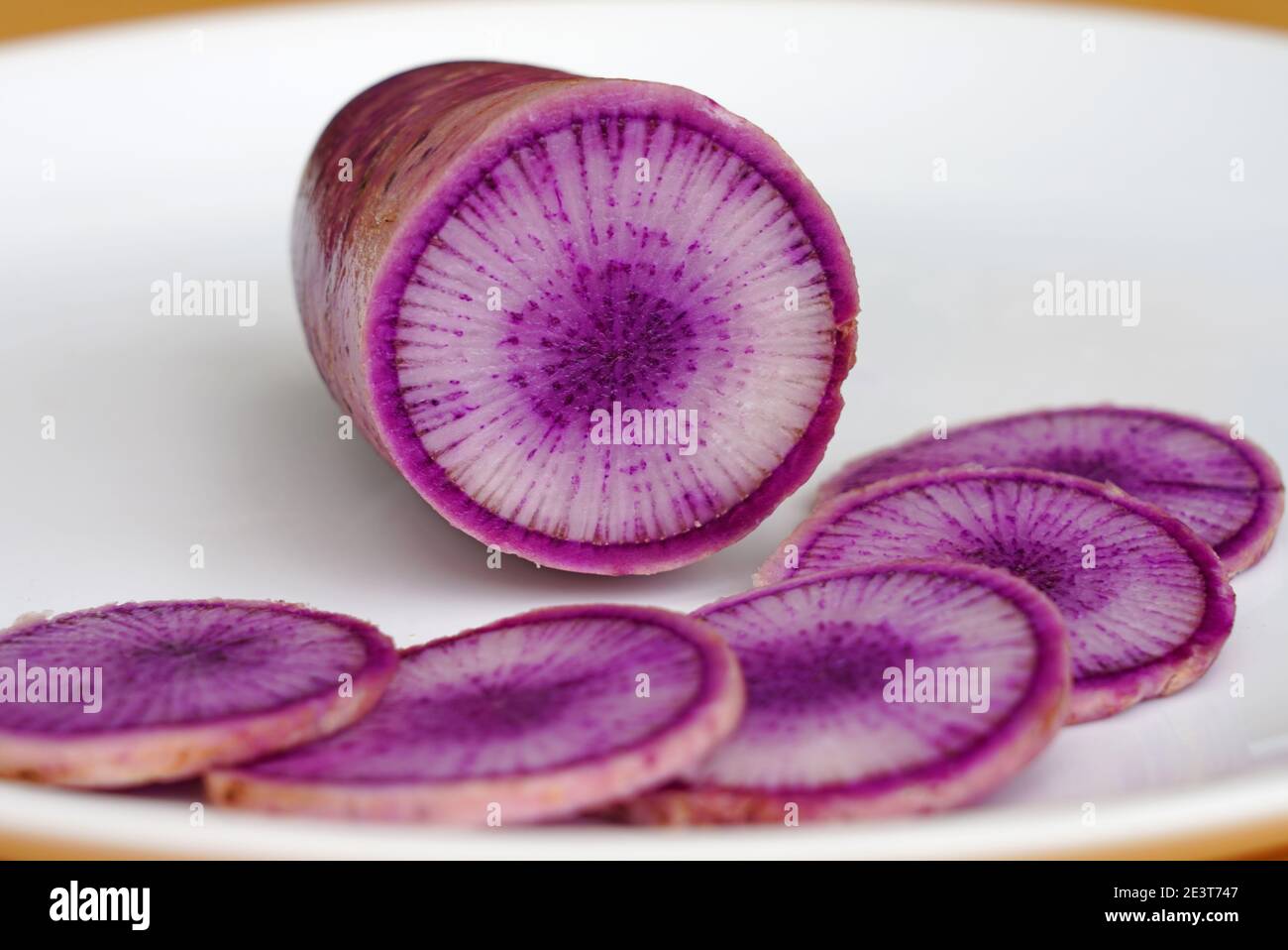 Slices of purple and white Blue Meat radish Stock Photo - Alamy
