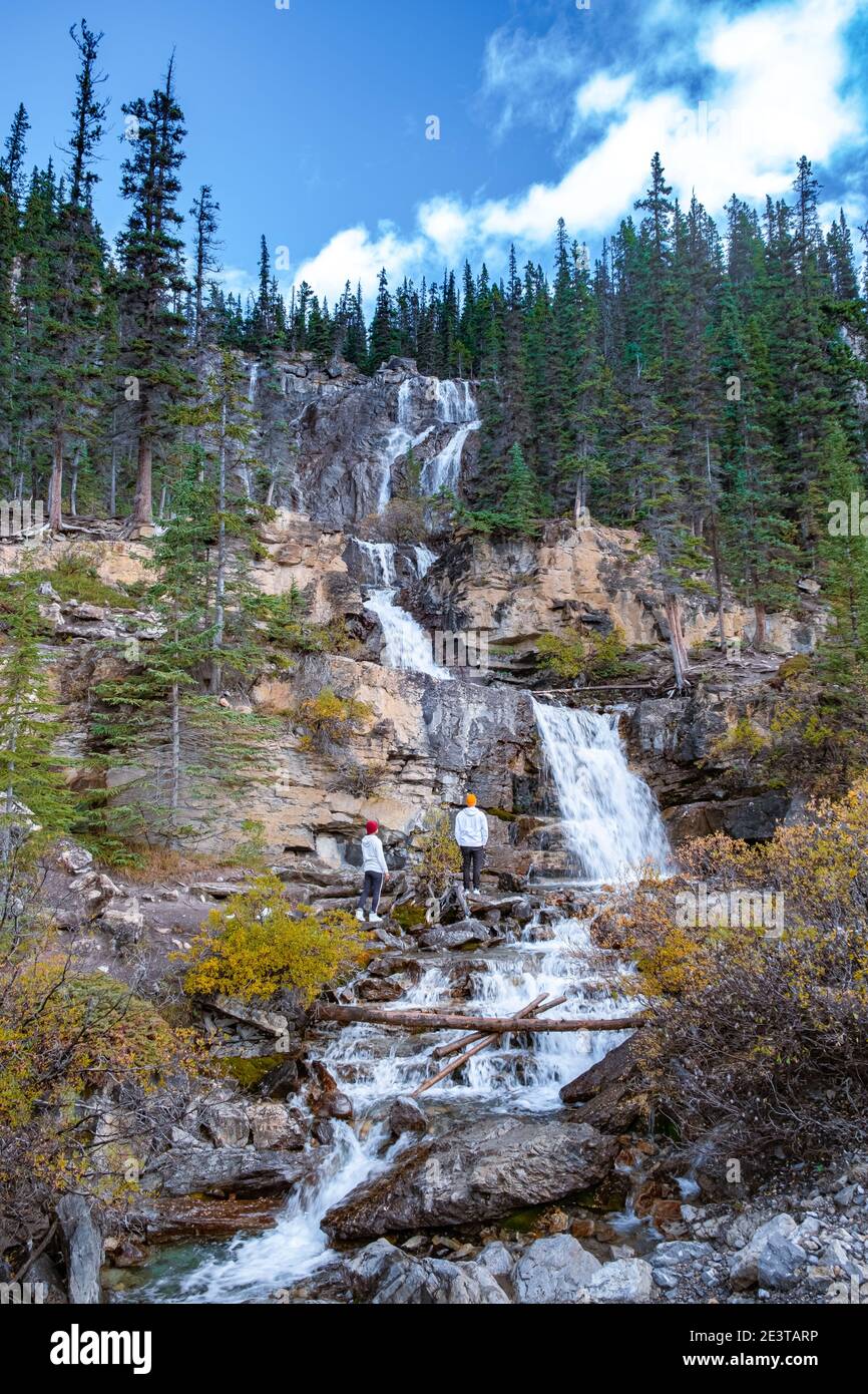 Tangle Creek Falls in Jasper National Park, Alberta, Canada, couple men ...