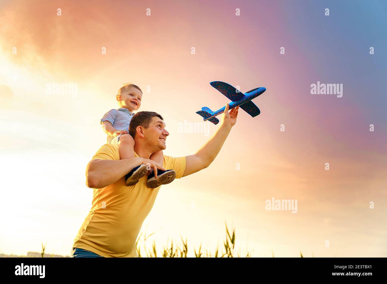 happy father with son playing with toy plane. dream to be a pilot Stock ...