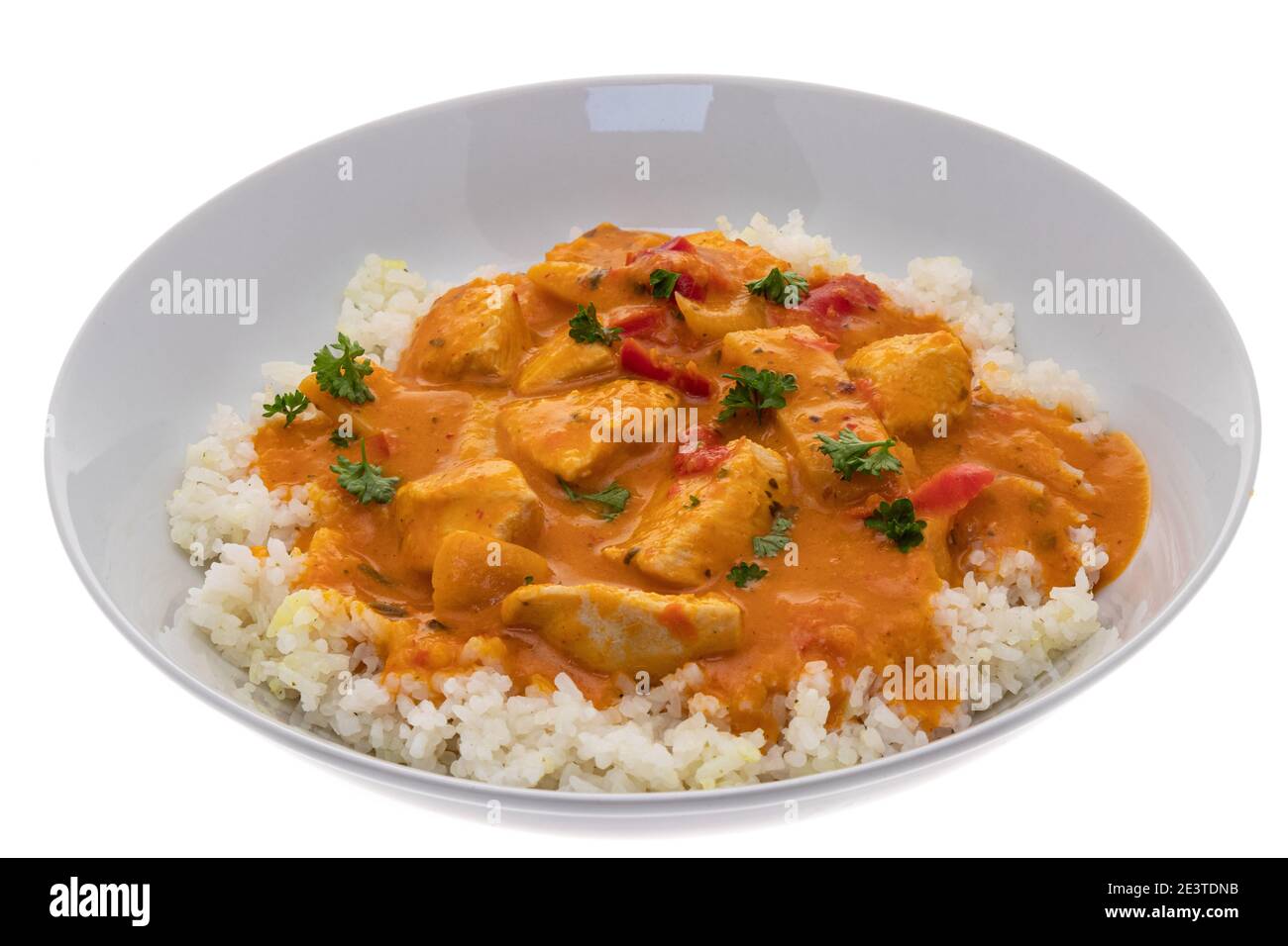 Thai red curry with white rice - white background Stock Photo - Alamy