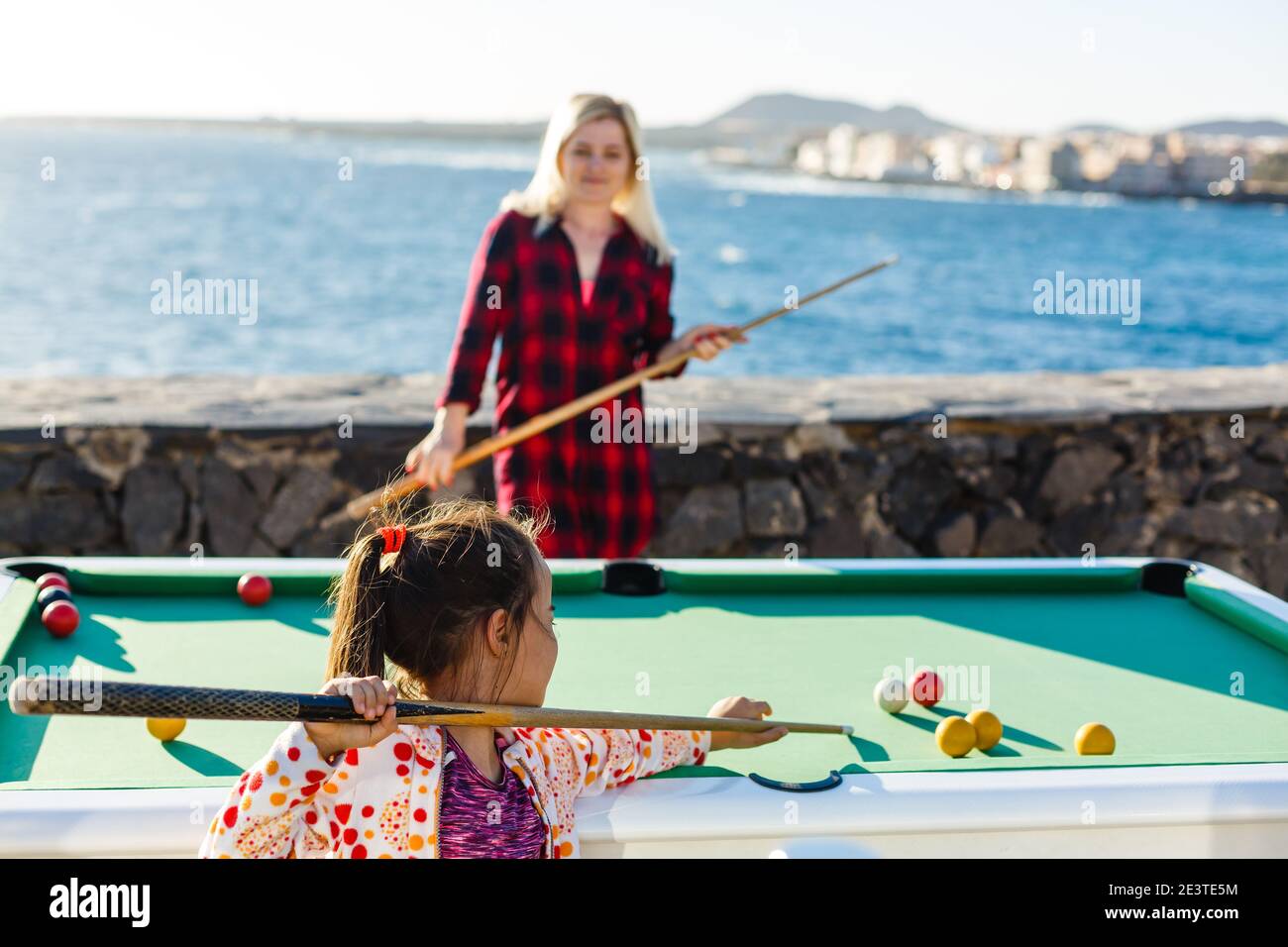 pool table near the sea, family plays billiards Stock Photo - Alamy
