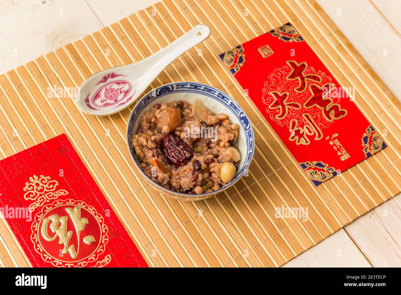 Bowl of traditional chinese laba zhou porridge and greeting cards for ...