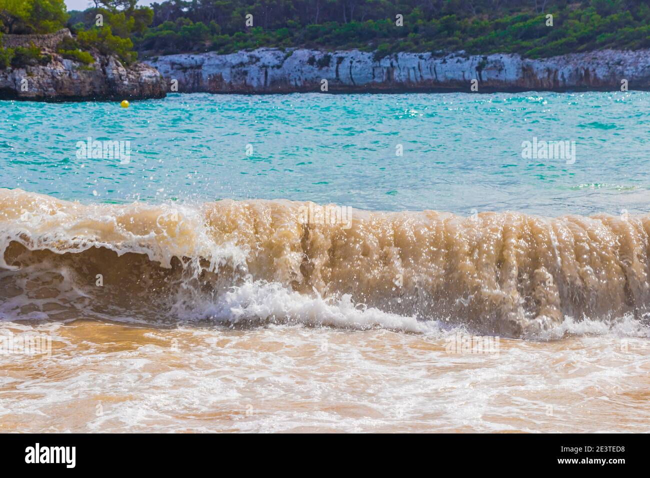 Turquoise beach ses Fonts de n’Alís in bay Caló d’en Garrot Mallorca Balearic Islands Spain ...