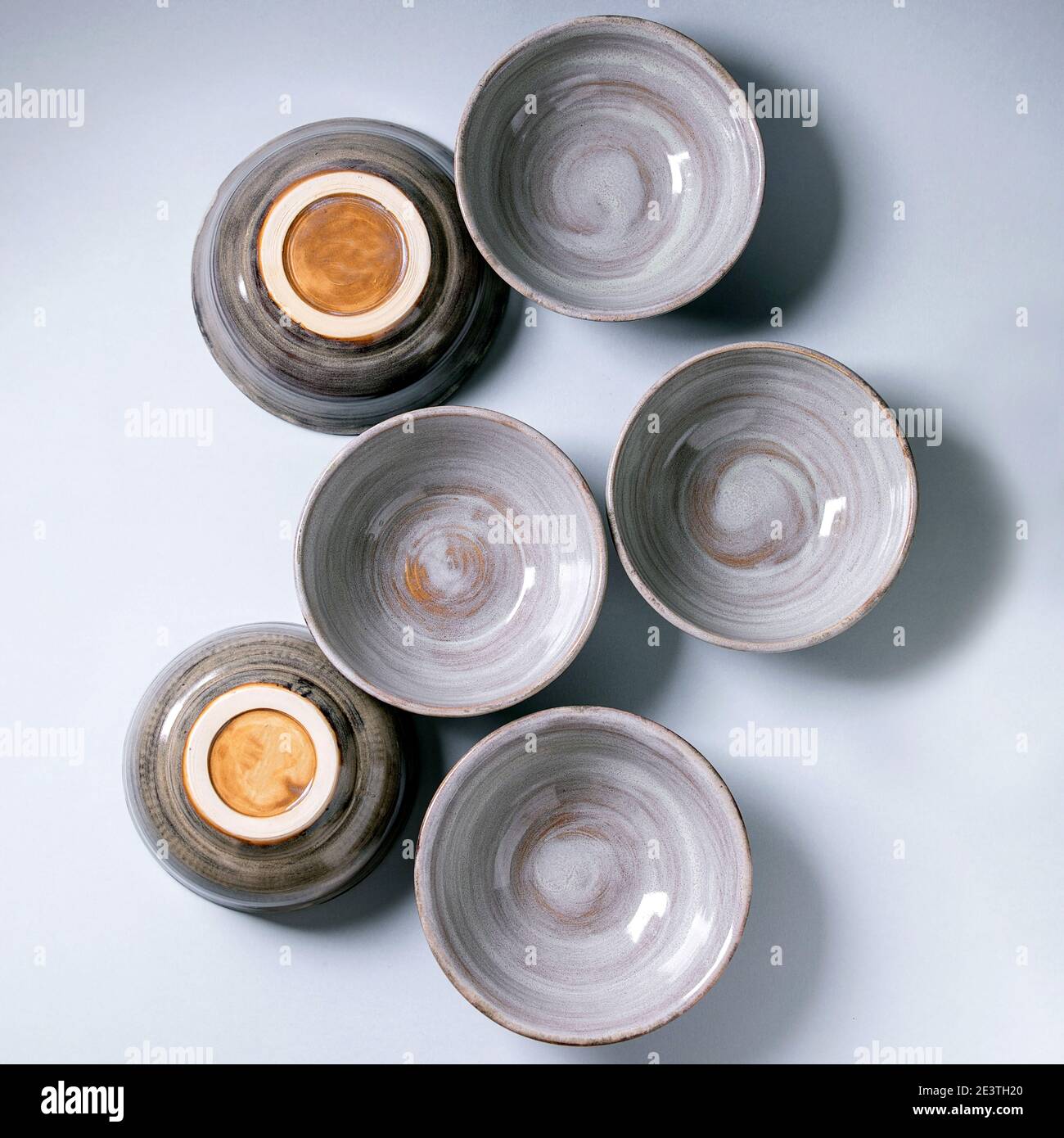 Set of empty bowls Stock Photo - Alamy