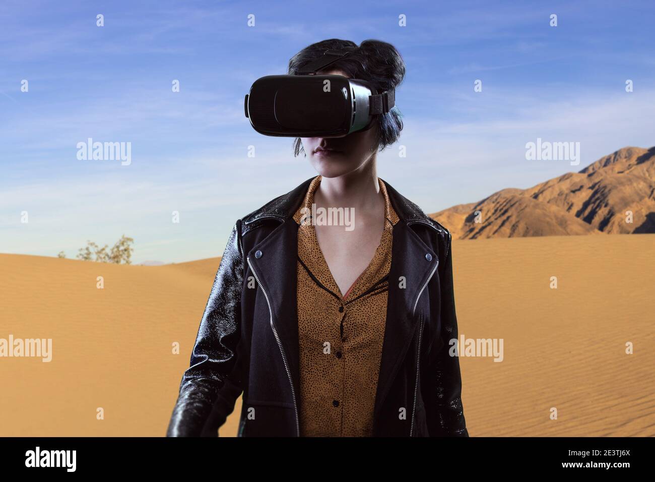 Woman wearing a virtual reality headset in a simulated hiking ...