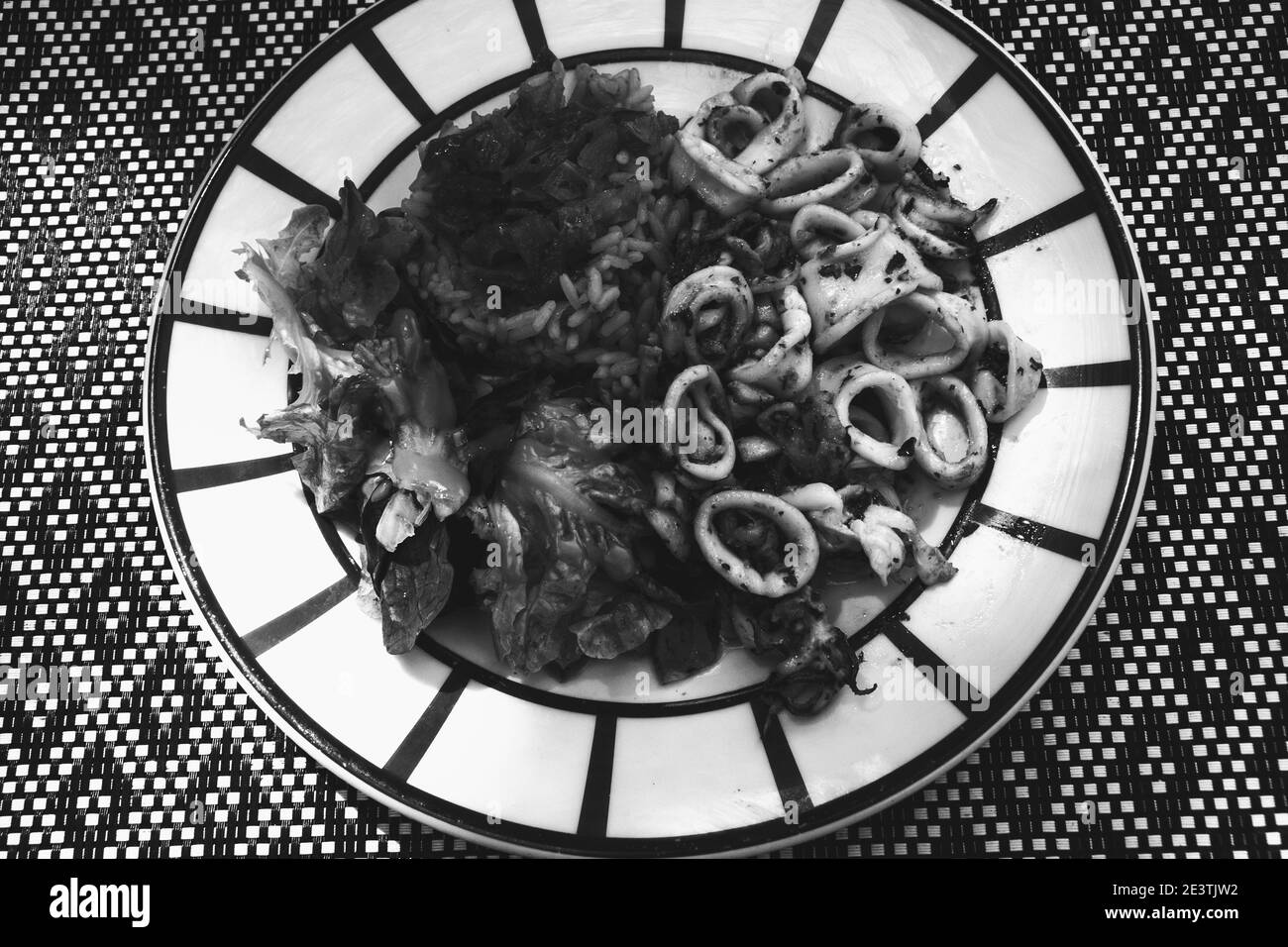 Gourmet dish at traditional French Basque country restaurant. Squids ...