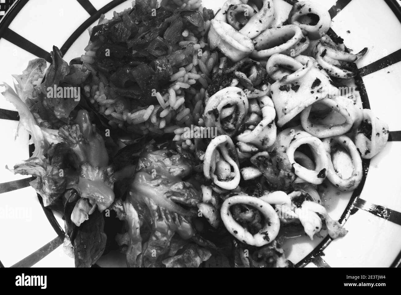 Gourmet dish at traditional French Basque country restaurant. Squids ...