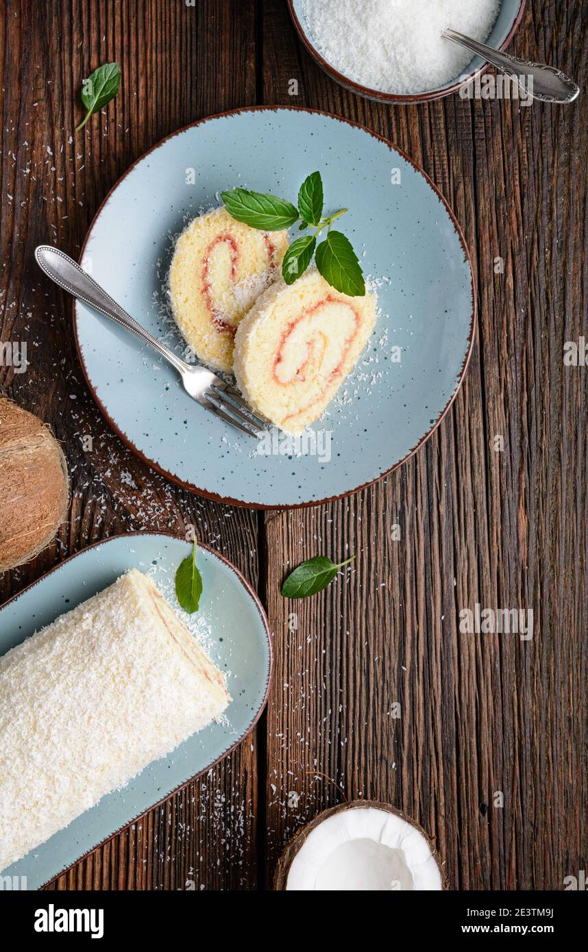 Delicious dessert, coconut roulade slices filled with vanilla and rum ...