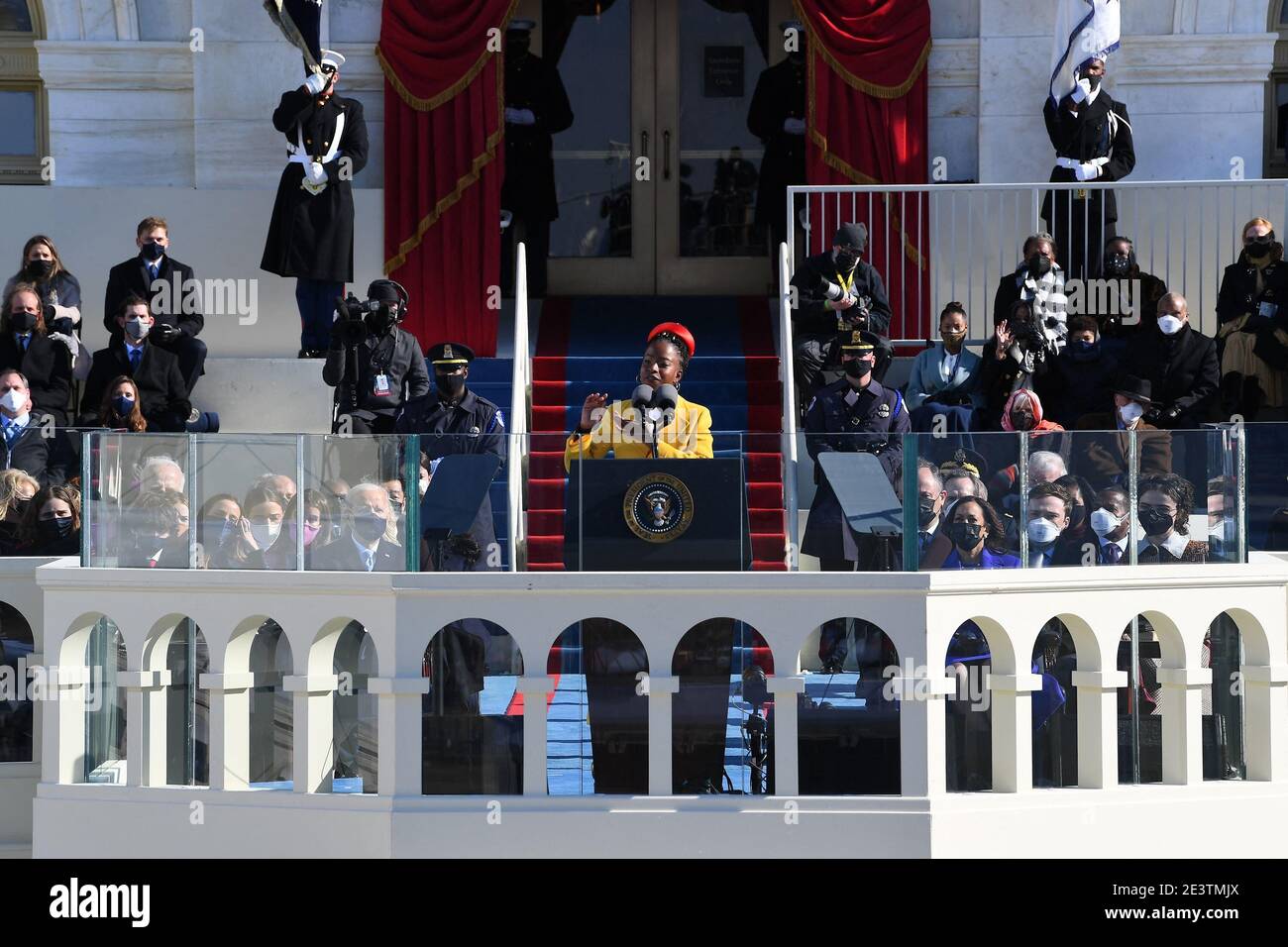 Jan 20, 2021; Washington, DC, USA; Amanda Gorman, 22, reads her ...