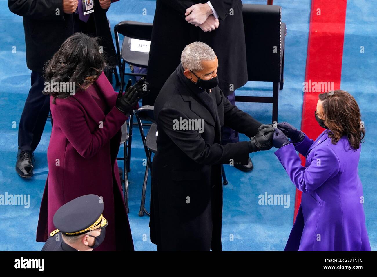 President-elect Kamala Harris, left, is greeted by former President ...