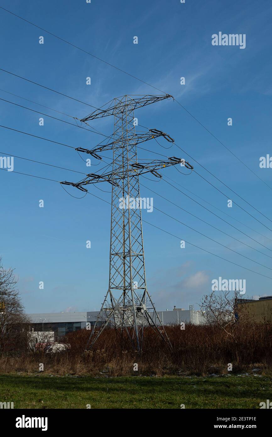 High voltage electrical pylons with wires against the sky. Electricity ...