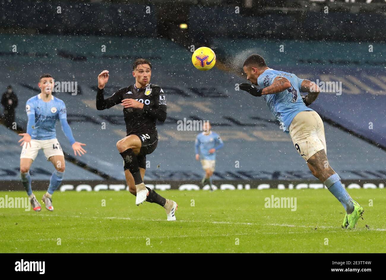 Manchester City's Gabriel Jesus (right) attempts a shot on goal during ...