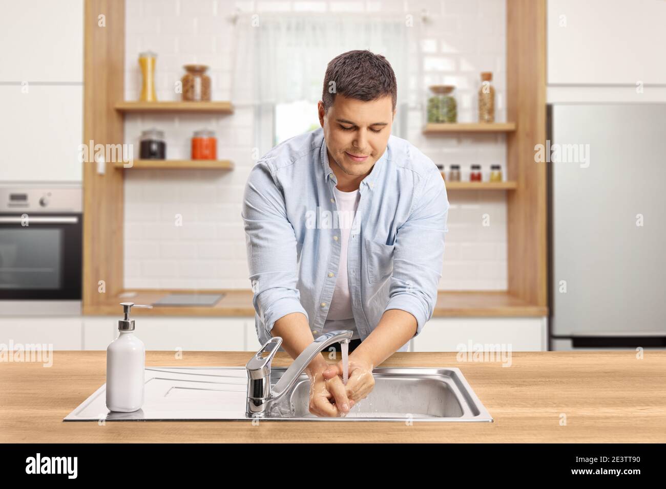 Man washing hands hi-res stock photography and images - Alamy