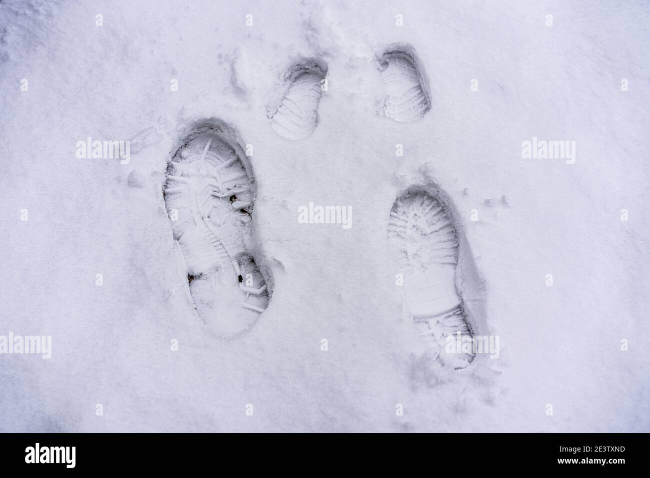 Footprints in the snow, shoe prints Stock Photo - Alamy