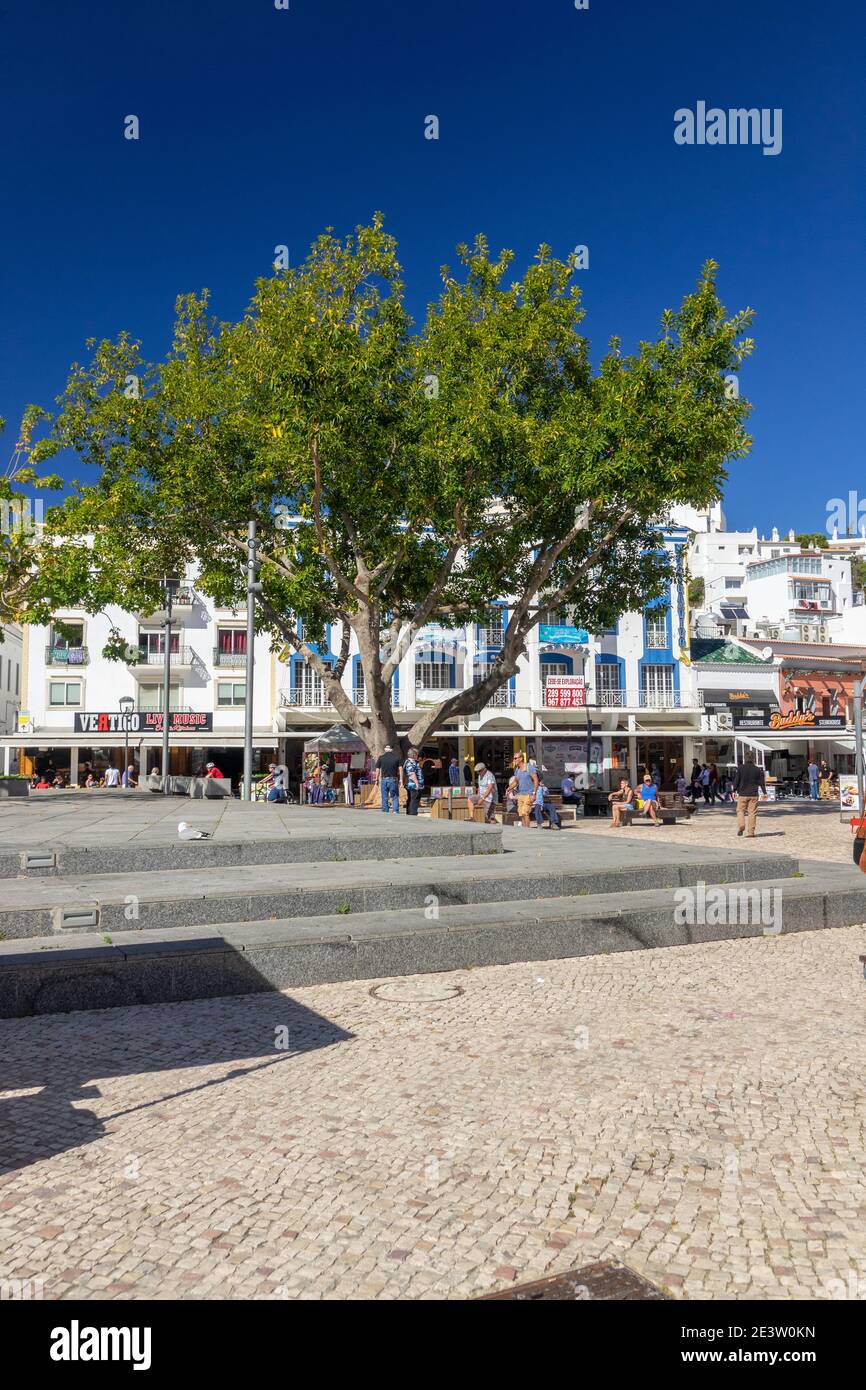 Shade tree albufiera old town square hi-res stock photography and ...