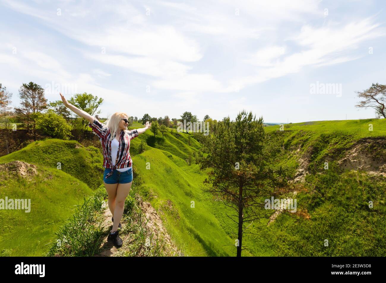 Attractive young woman enjoying her time outside in park, summer Stock ...