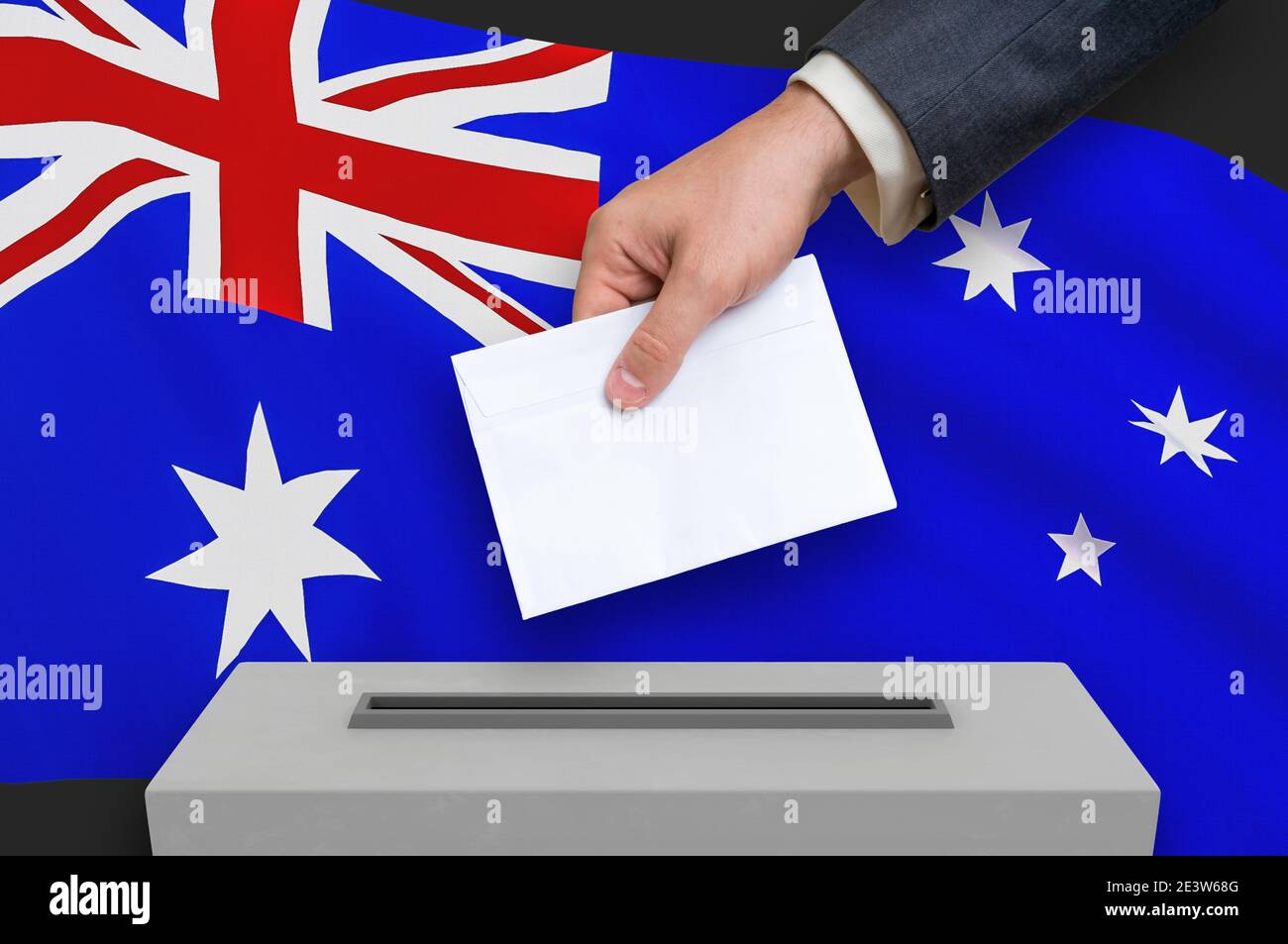 Election in Australia - voting at the ballot box. The hand of man is ...