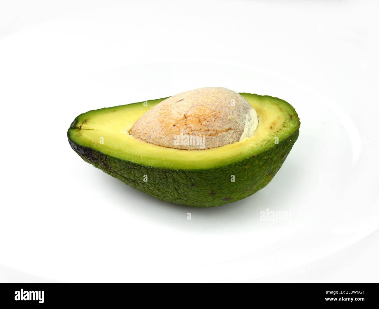 sliced avocado isolated on white background Stock Photo - Alamy