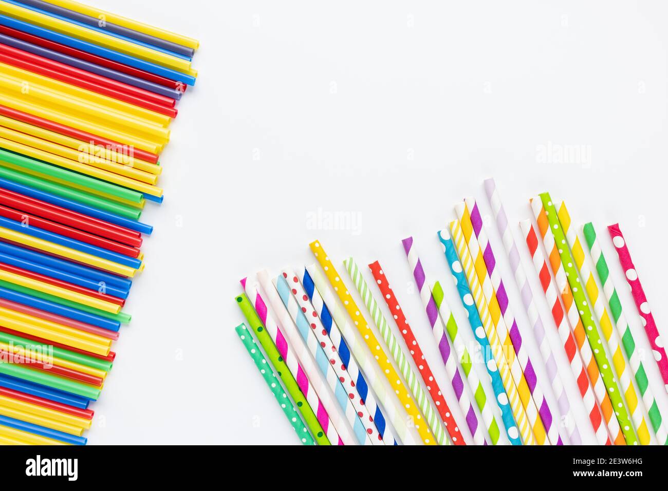 Plastic and paper straws on white background, environment concept Stock ...
