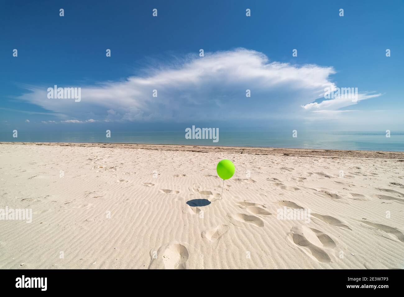 Balloon on background of ocean. Beach. Clouds Stock Photo - Alamy