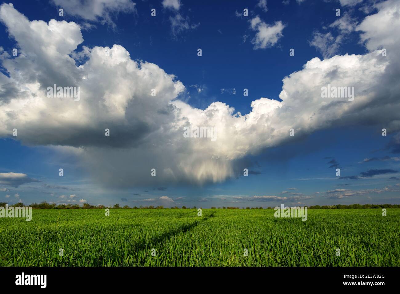 Rain clouds over plain hi-res stock photography and images - Alamy