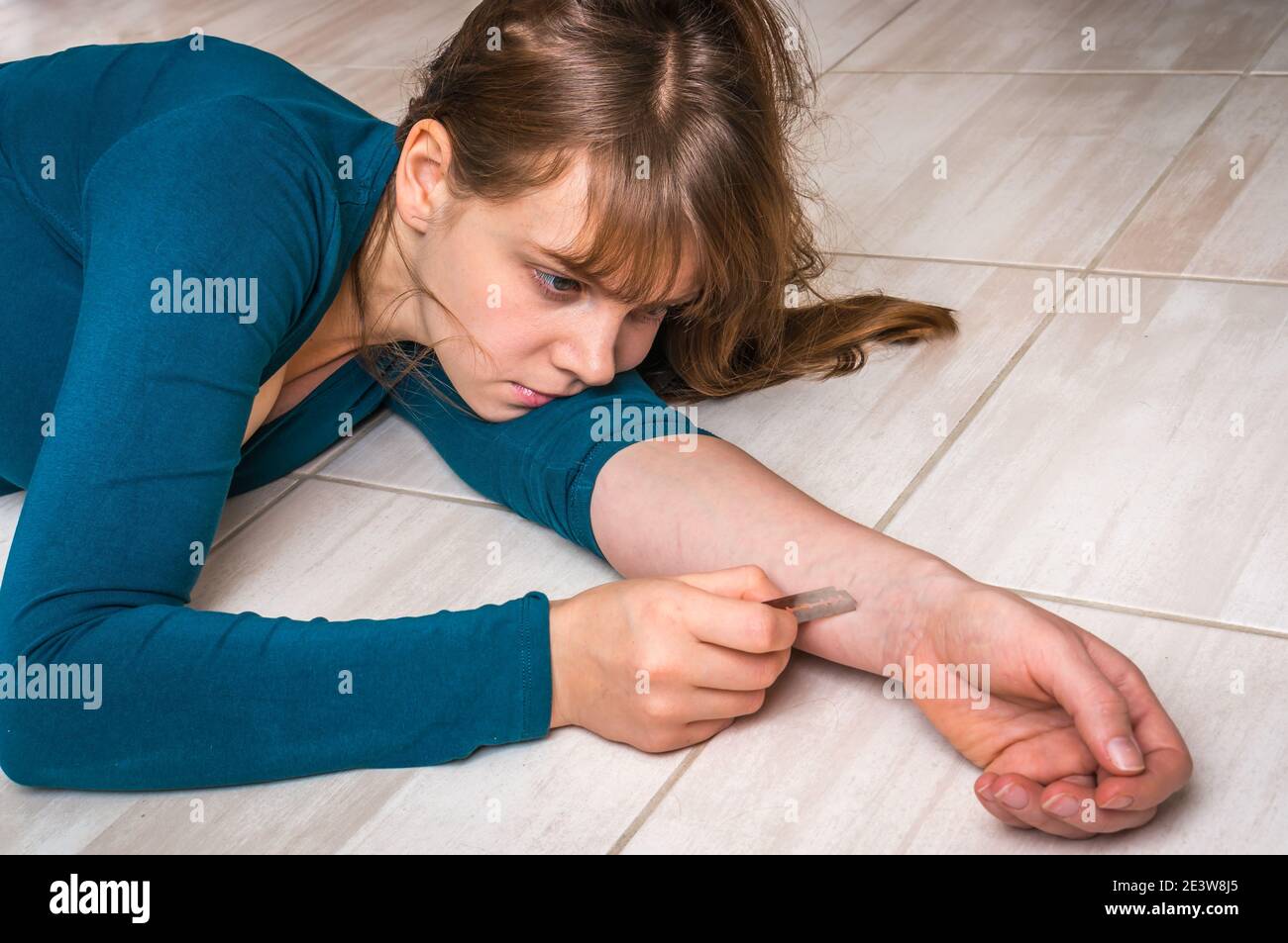 Suicidal suicide razor blade hi-res stock photography and images - Alamy