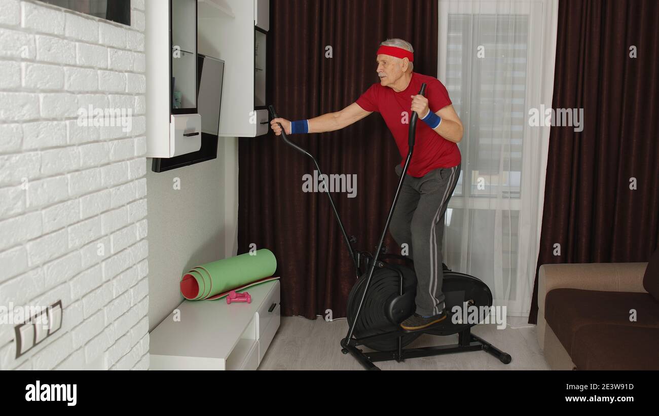 Senior man using orbitrek fitness hi-res stock photography and images ...