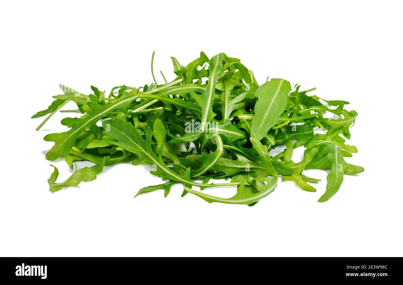 Rucola leaves isolated on white Stock Photo - Alamy