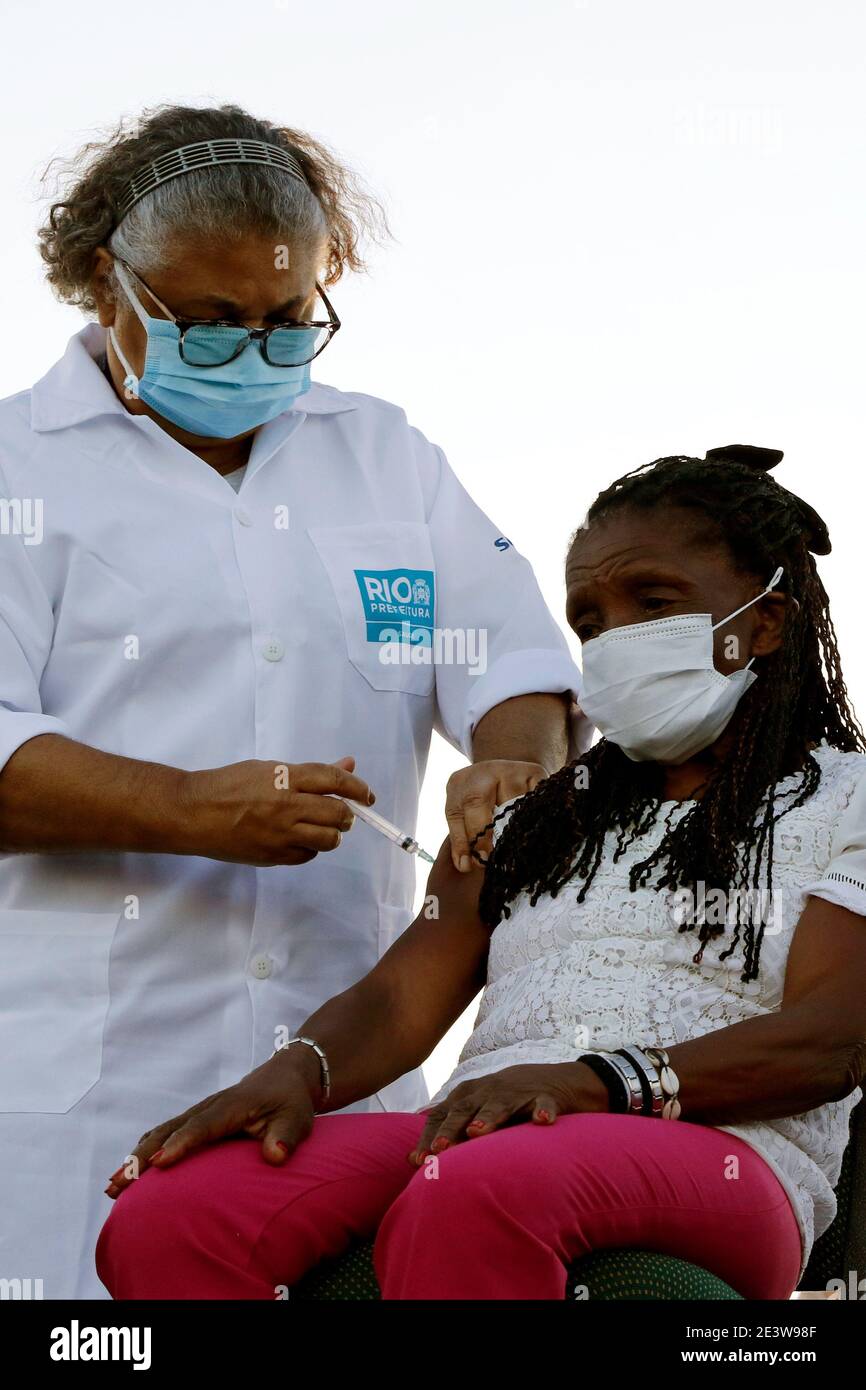 Elderly woman gets vaccine injection shot immunization for Covid-19 ...