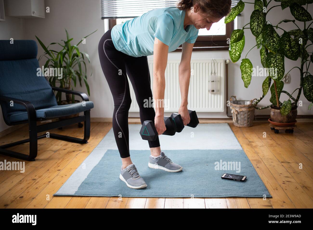 woman doing exercise at home Stock Photo - Alamy