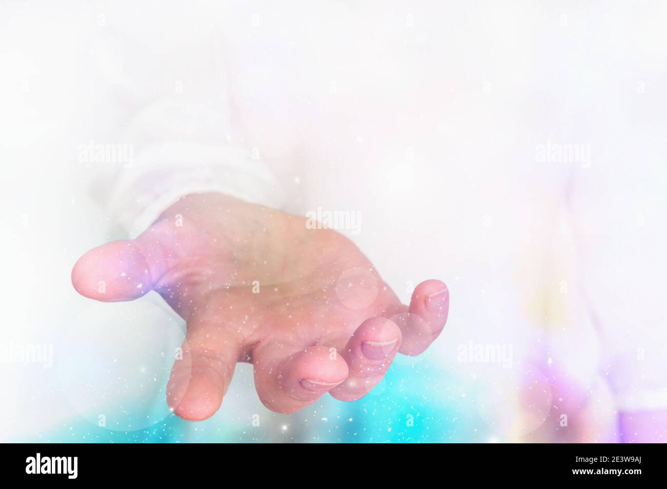 Magic hand with a mystical shine around on white background Stock Photo ...